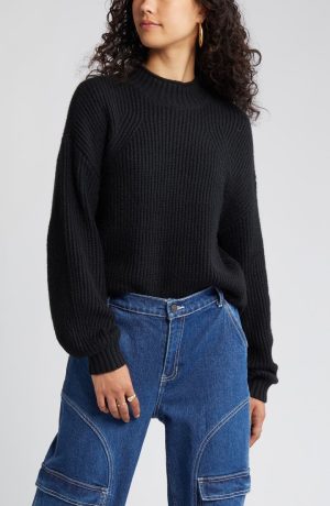 10 Chic Ways To Style A Black Sweater This Season
